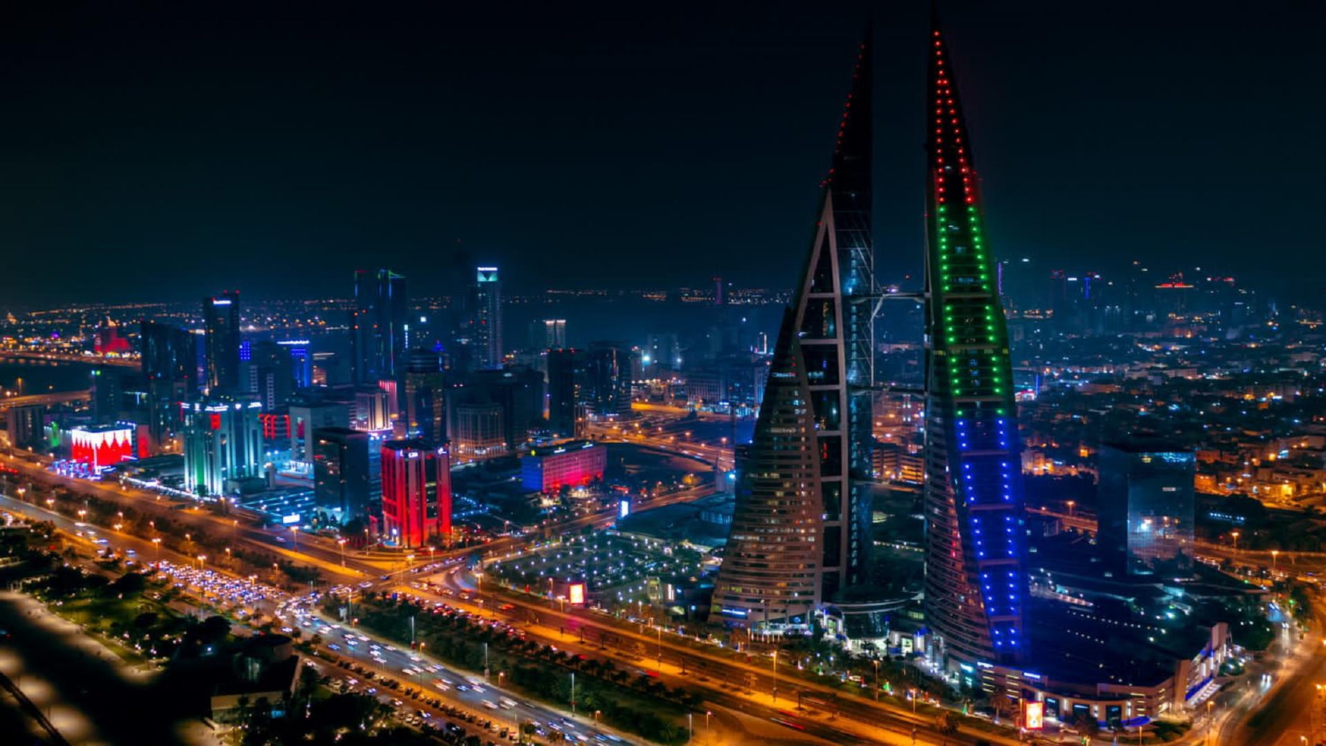 Vital facilities in Bahrain lit with UAE flag colours